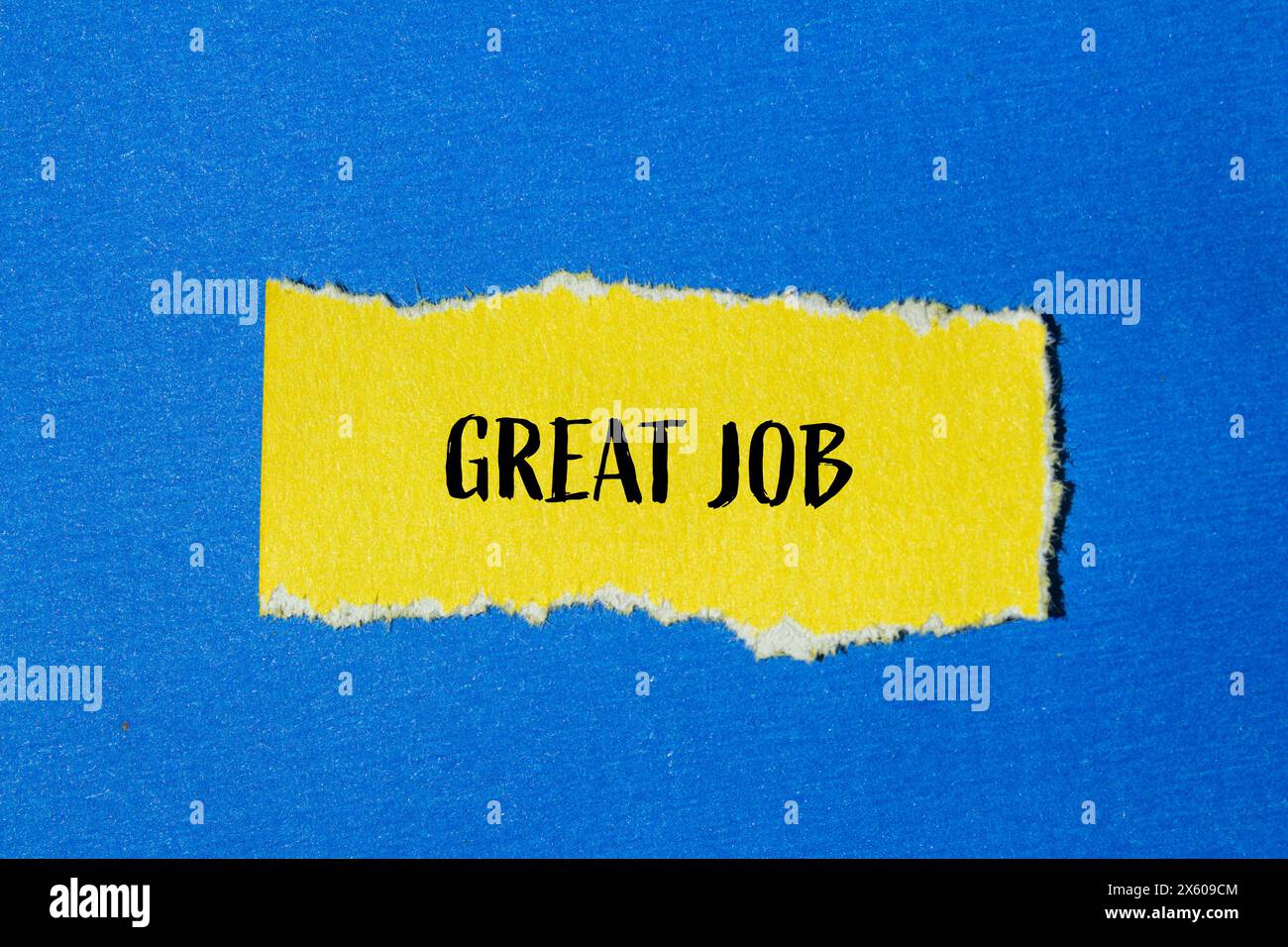 Great job written on ripped yellow paper with blue background ...