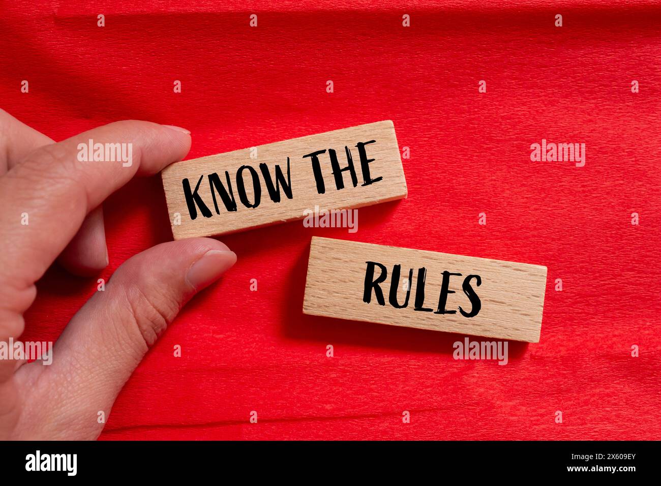 Know the rules words written on wooden blocks with red background ...