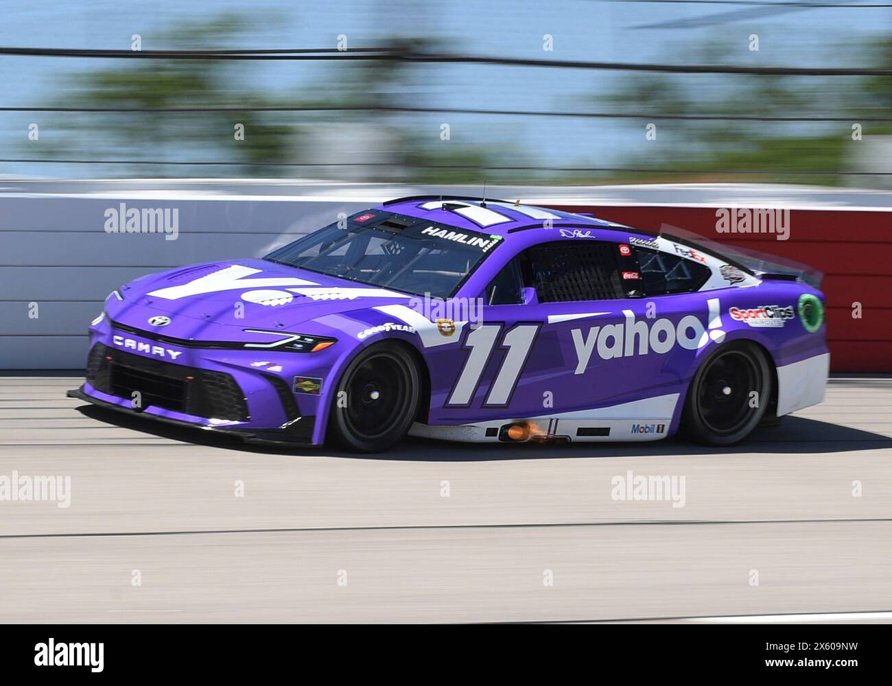 DARLINGTON, SC - MAY 11: Denny Hamlin (#11 Joe Gibbs Racing Yahoo! Toyota) races through Turn 1 ...