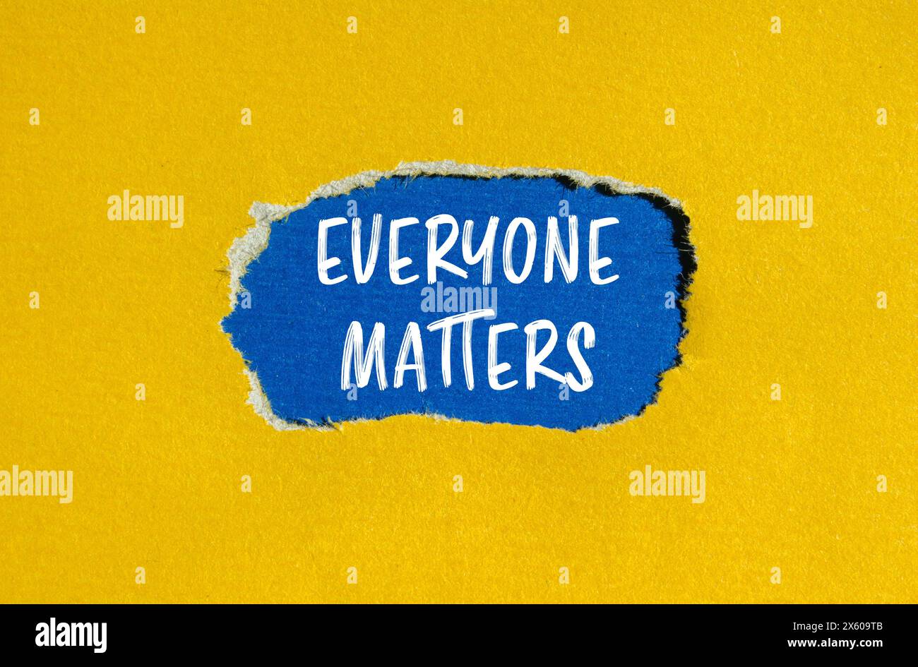 Everyone matters words written on ripped yellow paper with blue ... Everyone matters words written on ripped yellow paper with blue ...