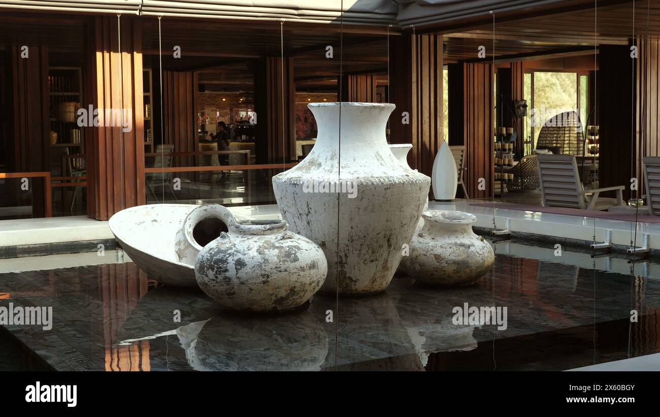 Large ceramic vases with ancient traditional design displayed outdoors ...