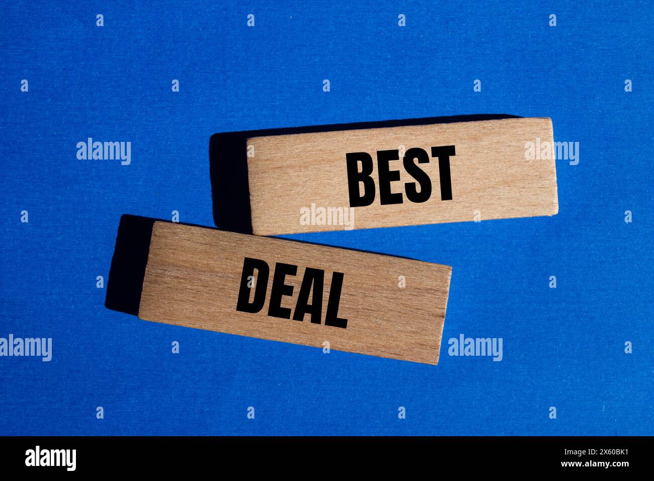 Best deal words written on wooden blocks with blue background ...
