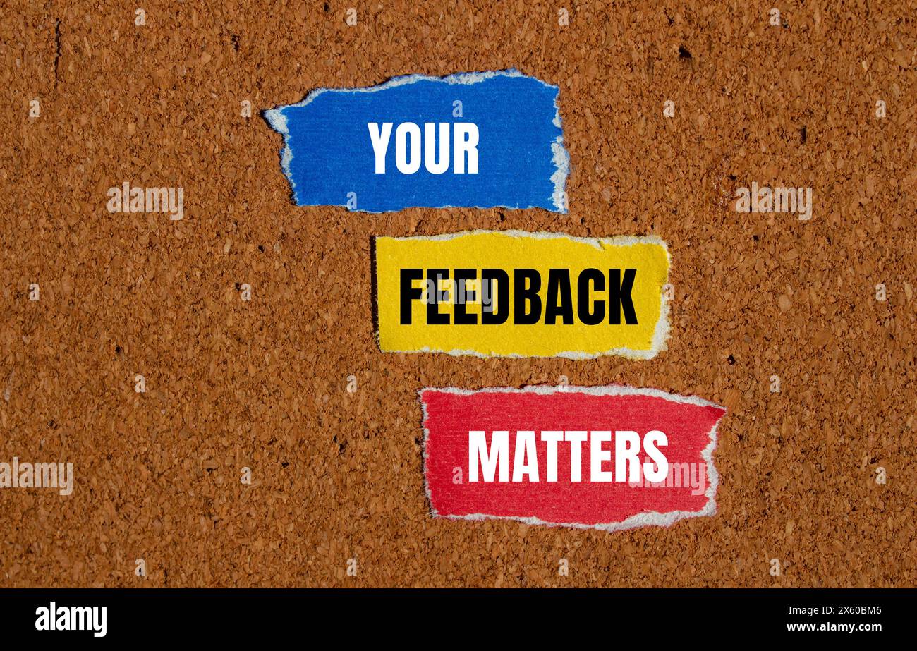 Your feedback matters words written on ripped paper pieces with brown ...