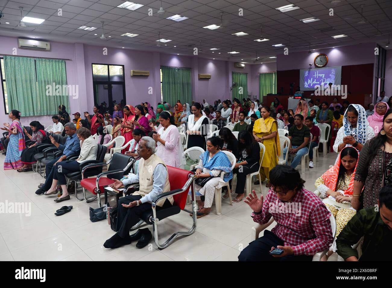 Pious mother hi-res stock photography and images - Alamy