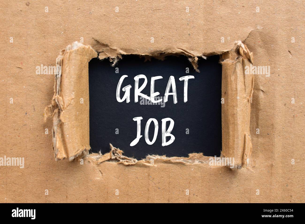 Great job written on ripped cardboard paper with black background ...