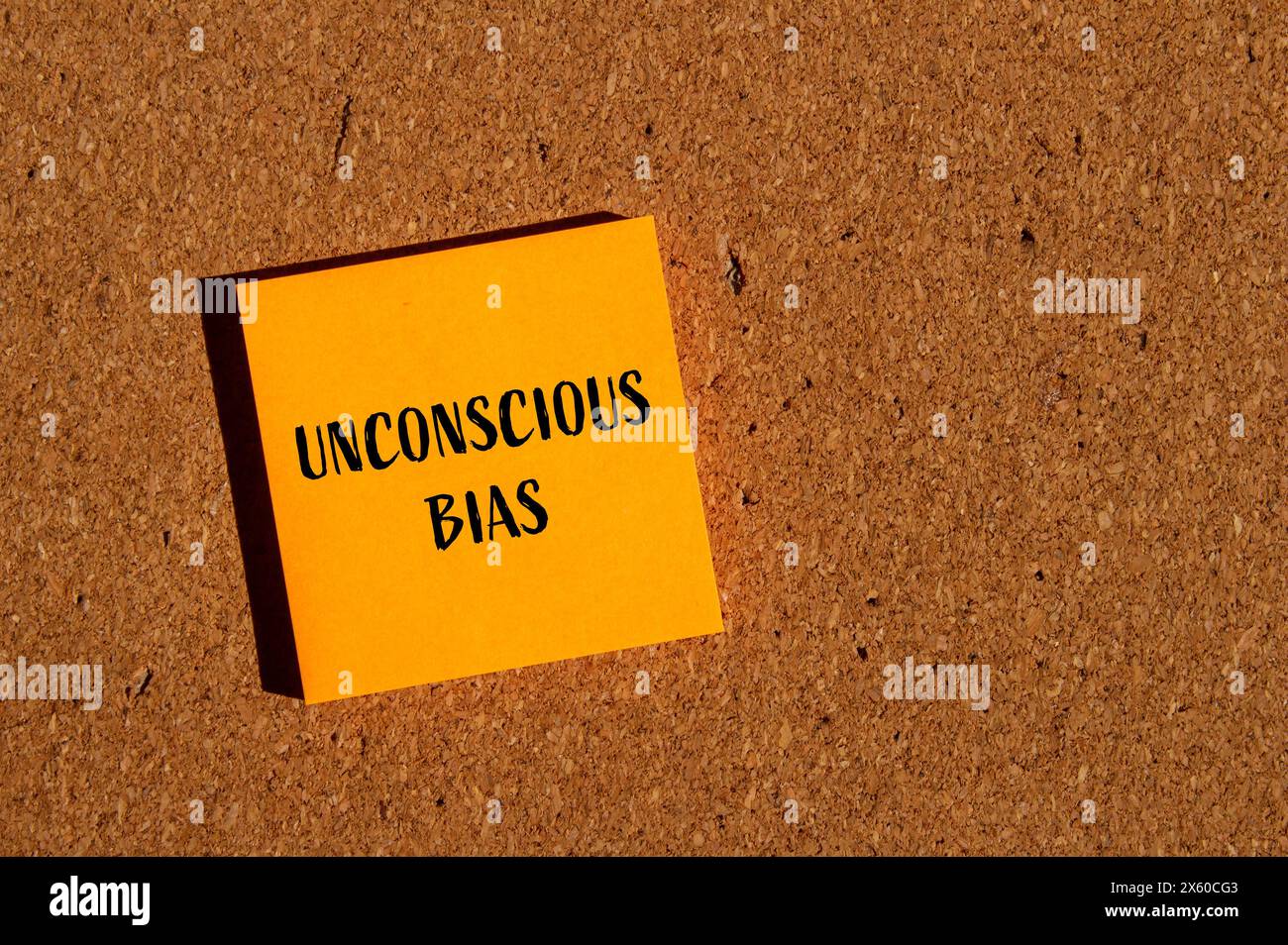 Unconscious Bias Words Written On Orange Paper Sticker With Brown Background Conceptual 