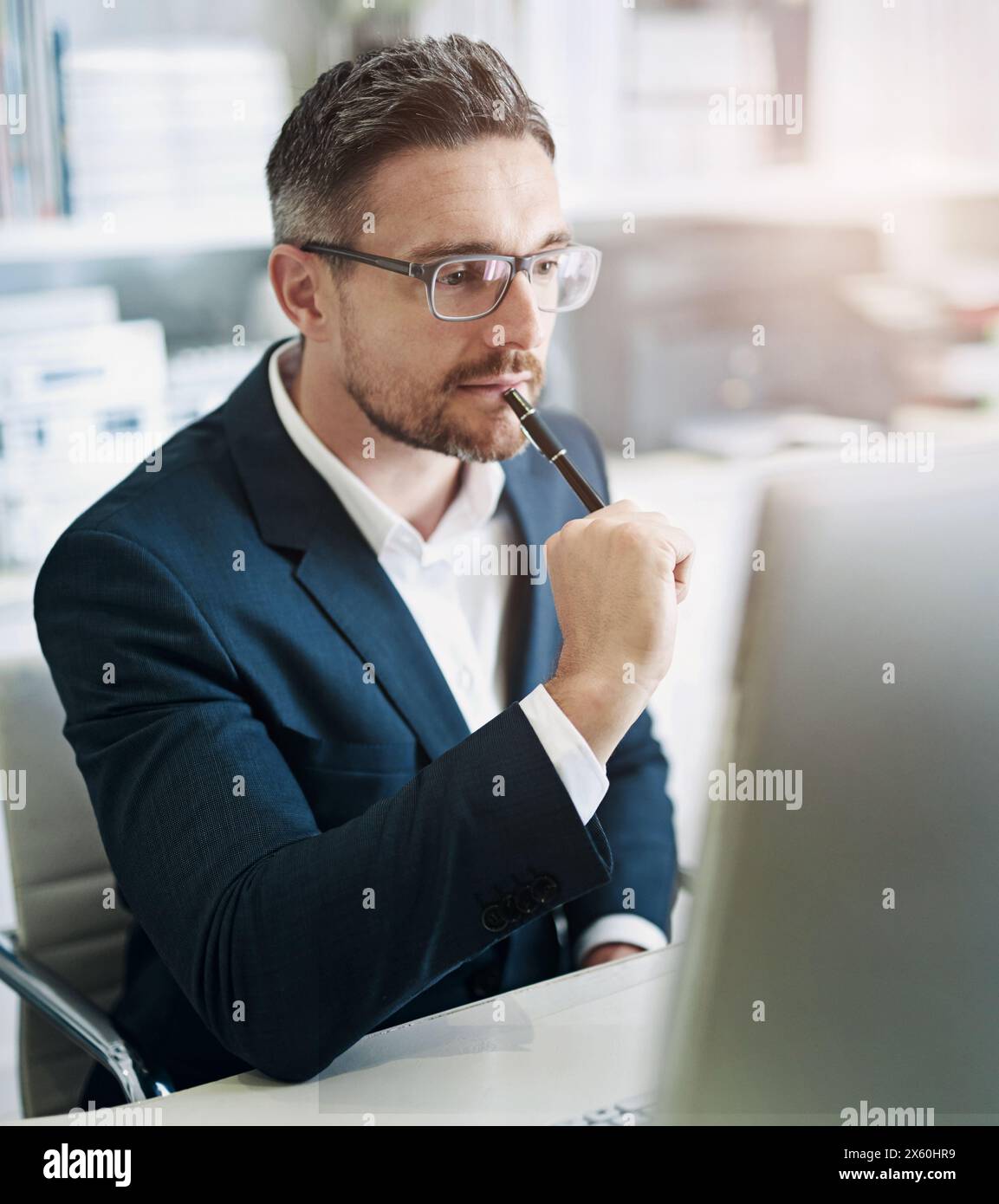 Thinking, monitor and businessman face by desk with corporate ideas for ...