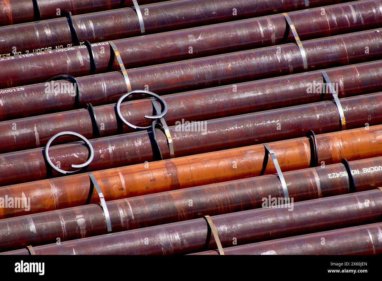 A light coating of rust on large diameter steel pipes, most likely due ...