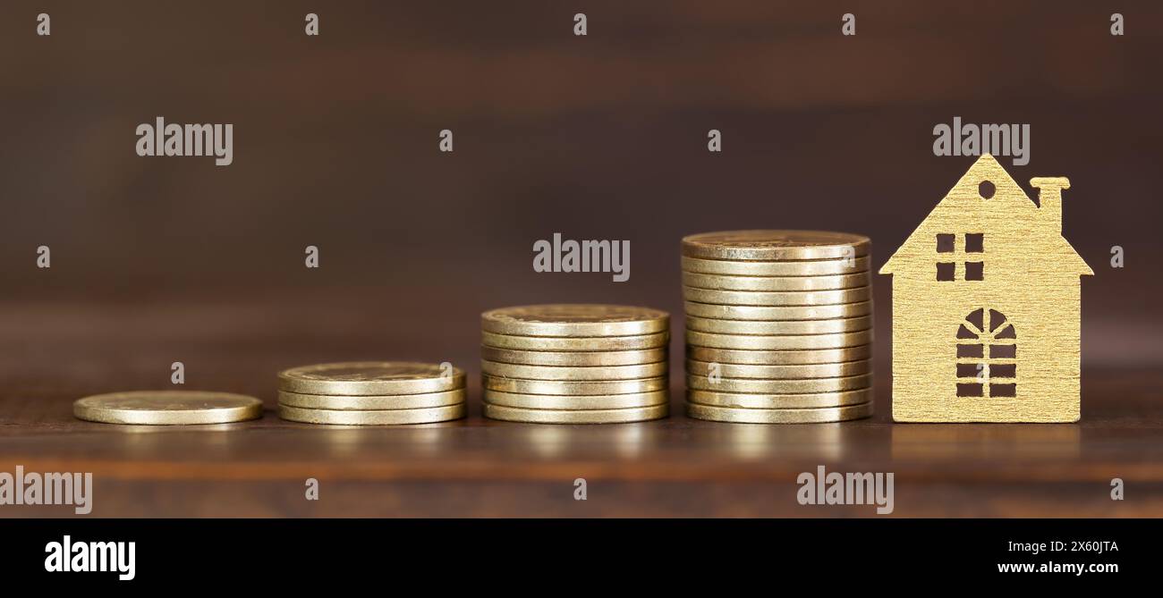 House and gold coins. Real estate, property investment, business banner ...
