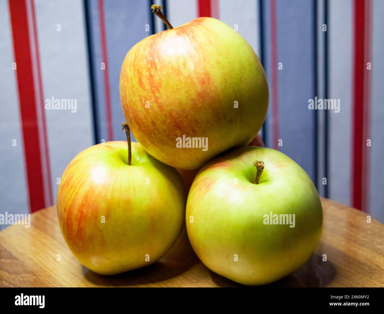 Fresh Apples Display. Apples with a mix of colors presented on wood ...