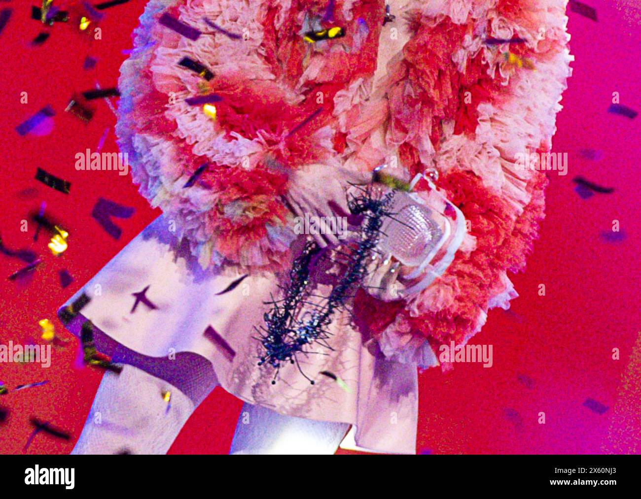 12 May 2024, Sweden, Malmö: Nemo from Switzerland holds the broken ...