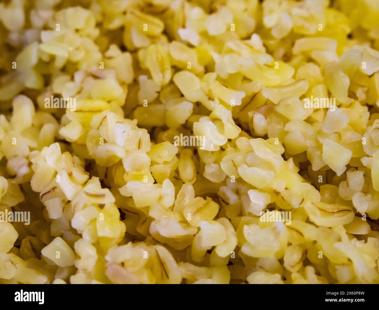 Boiled bulgur. Bulgur grains close-up, porridge full frame Stock Photo ...