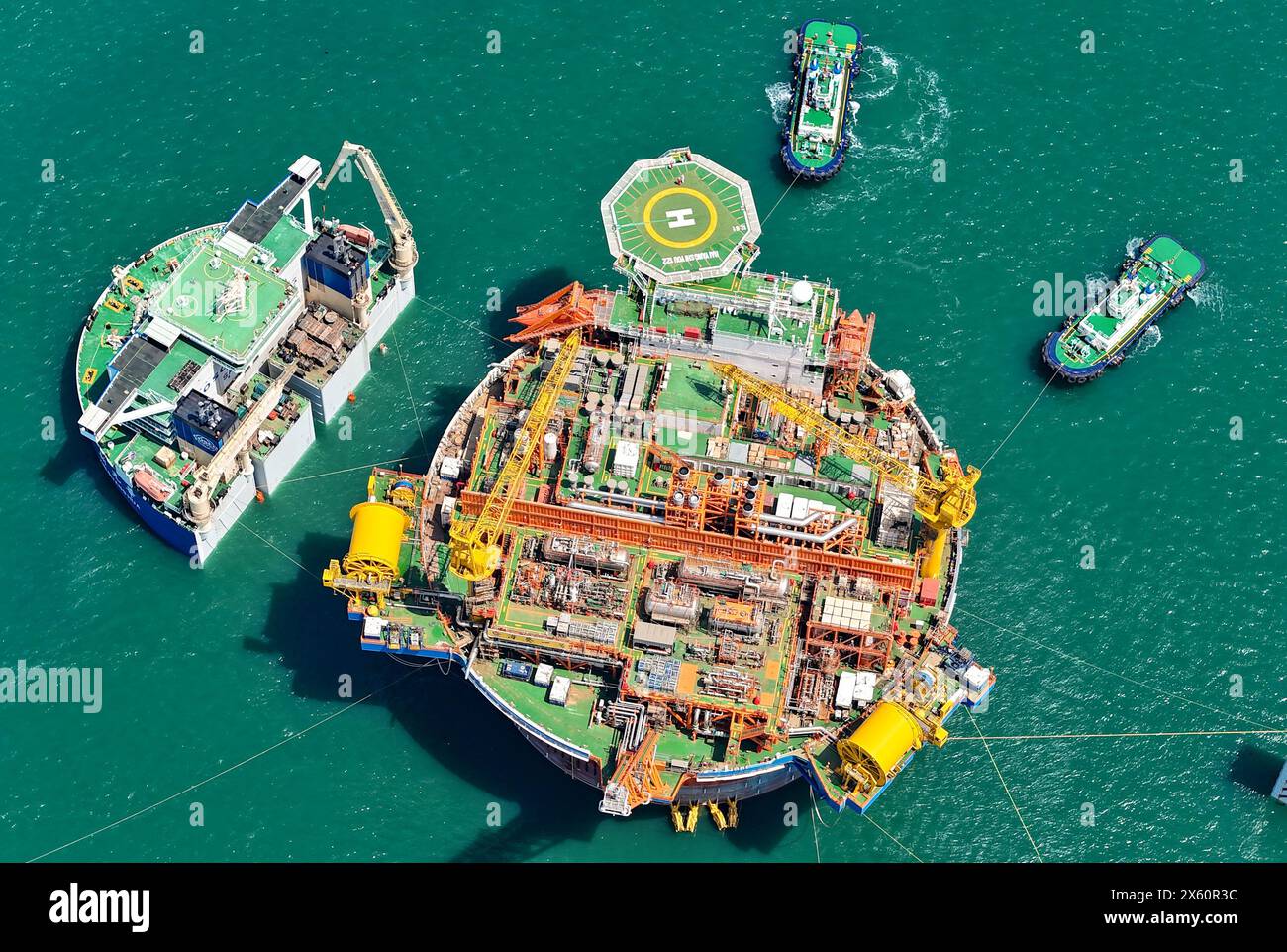 QINGDAO, CHINA - MAY 12, 2024 - The "Haikui No. 1" is loaded on a ship ...