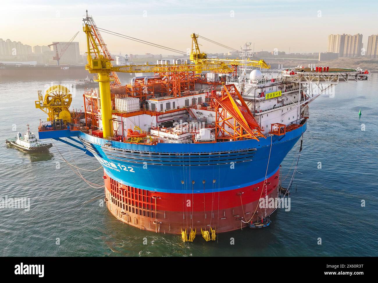 QINGDAO, CHINA - MAY 12, 2024 - The "Haikui No. 1" is loaded on a ship ...