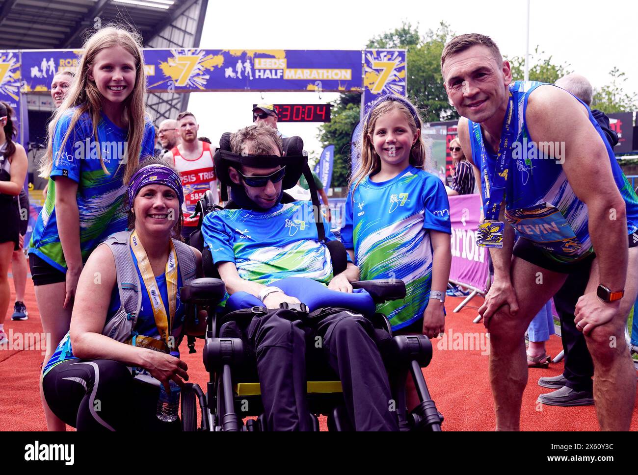 Rob Burrow alongside wife Lindsey (who ran the half marathon ...