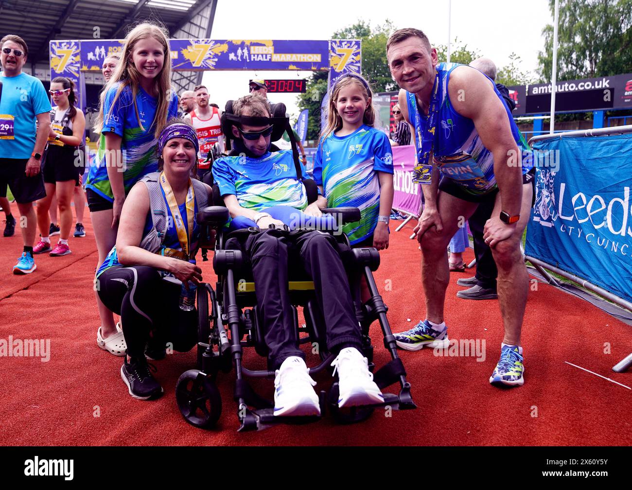 Rob Burrow alongside wife Lindsey (who ran the half marathon ...