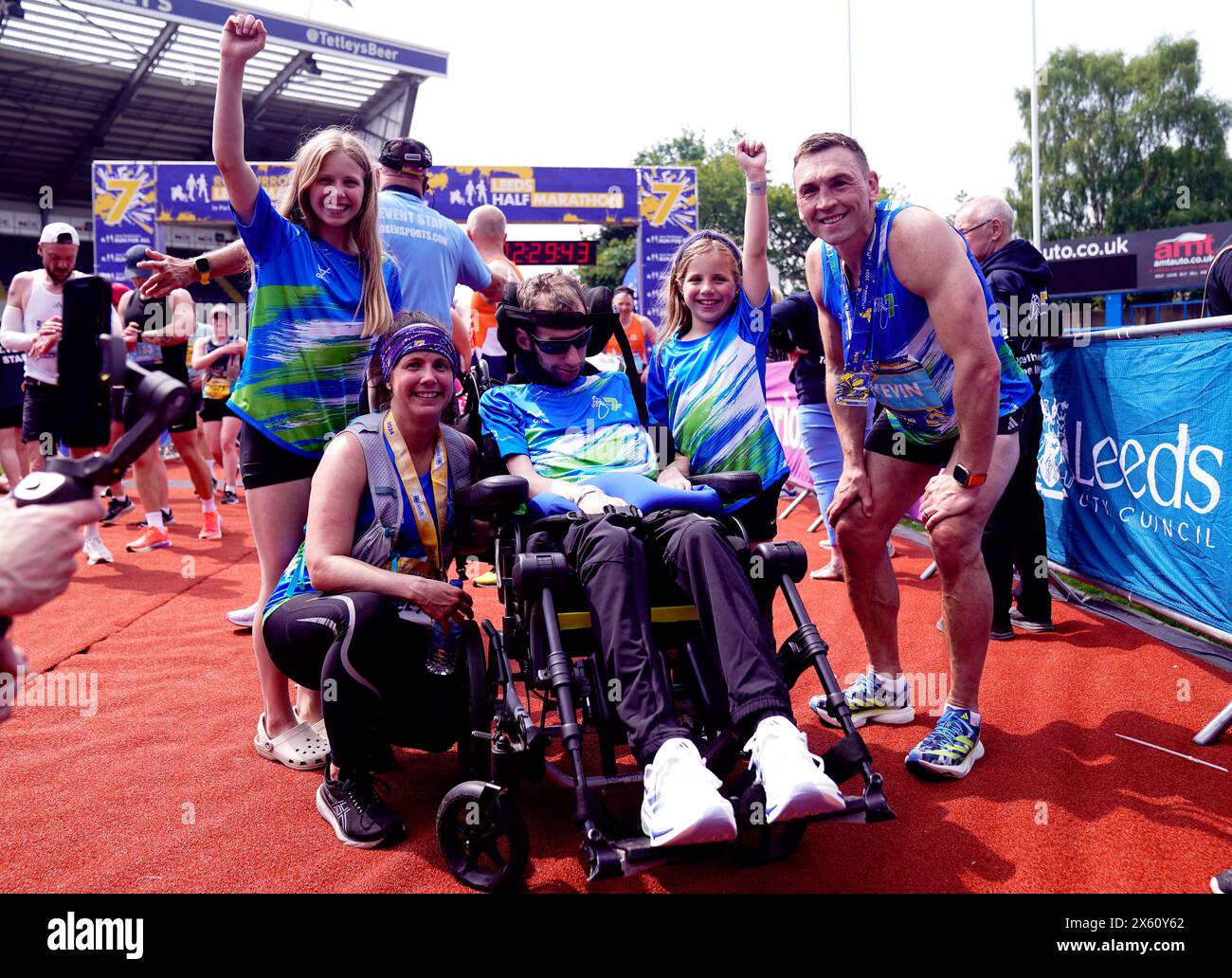 Rob Burrow alongside wife Lindsey (who ran the half marathon ...