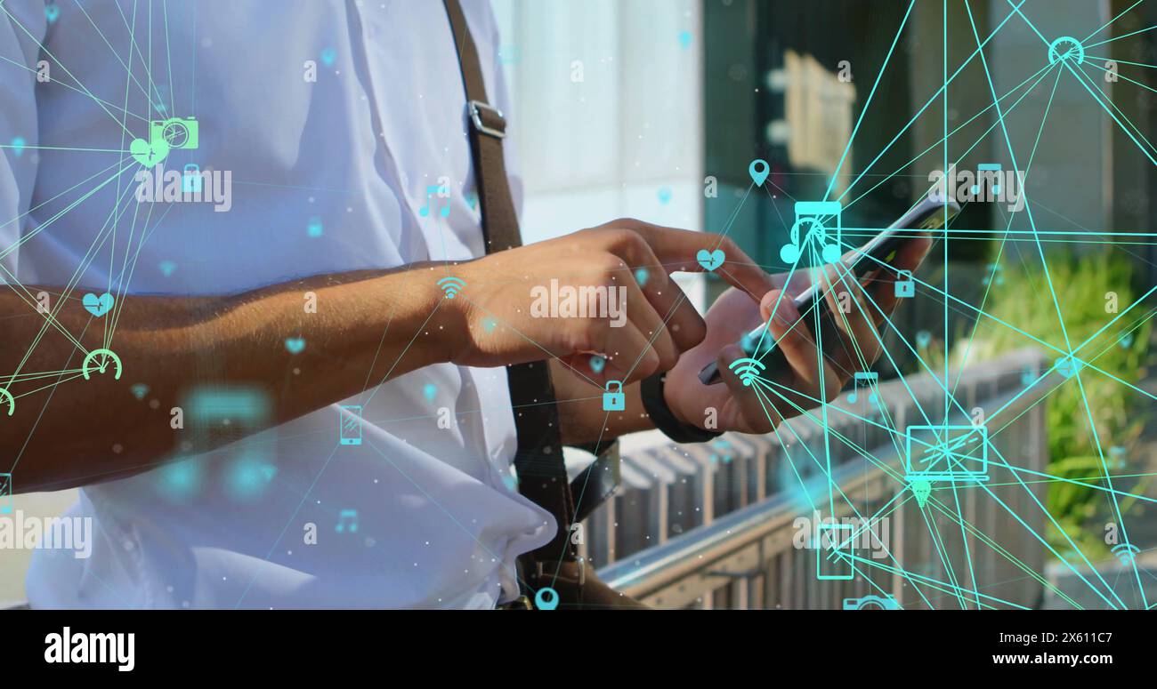 Image of connected icons globes over midsection of biracial man scrolling on smartphone Stock ...