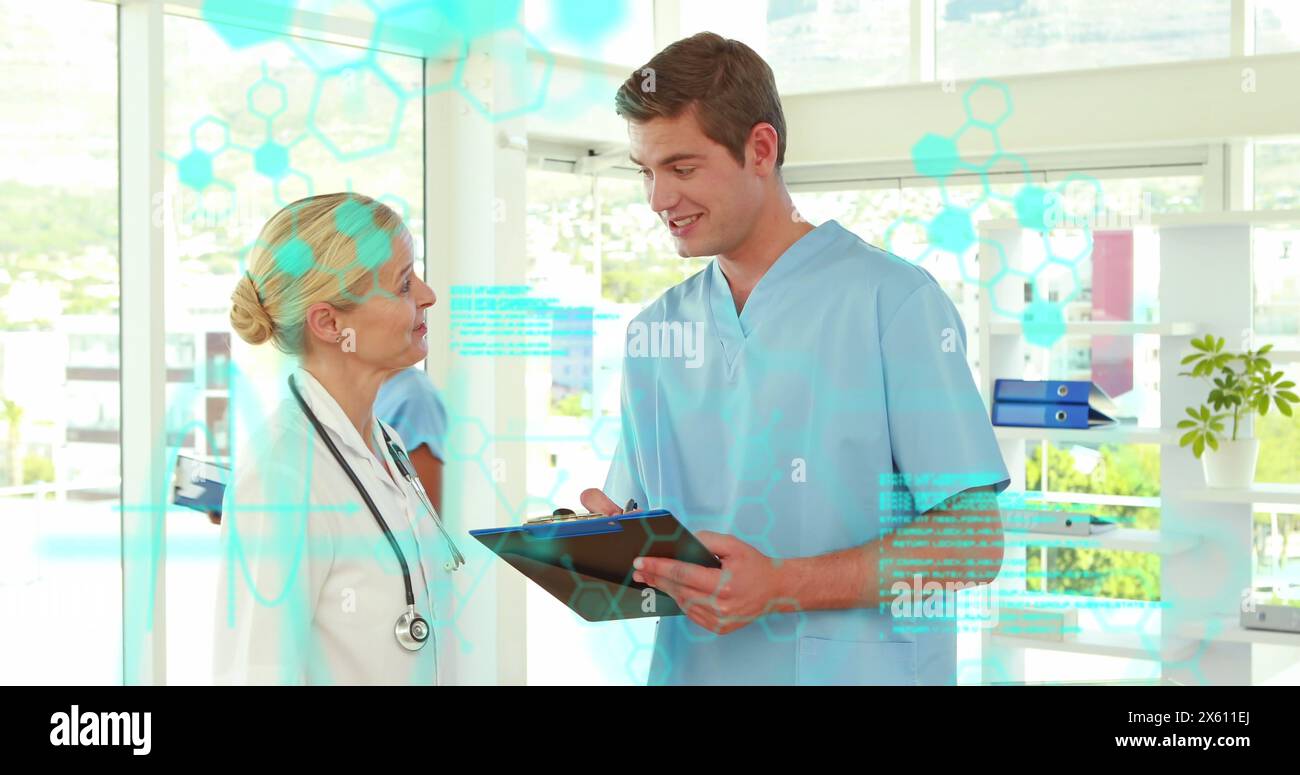 Image of medical data processing over caucasian male and female doctors ...