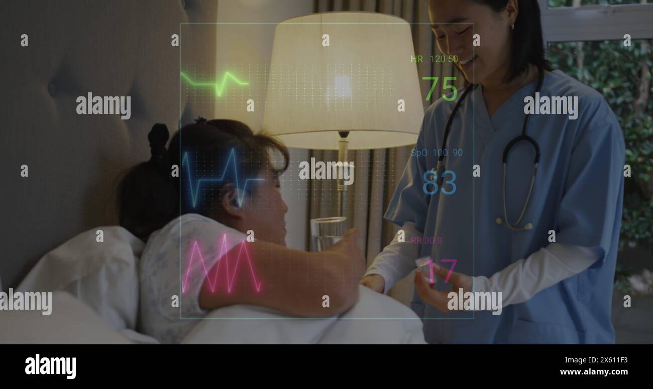 Image of heart rate monitor over asian female health worker giving ...