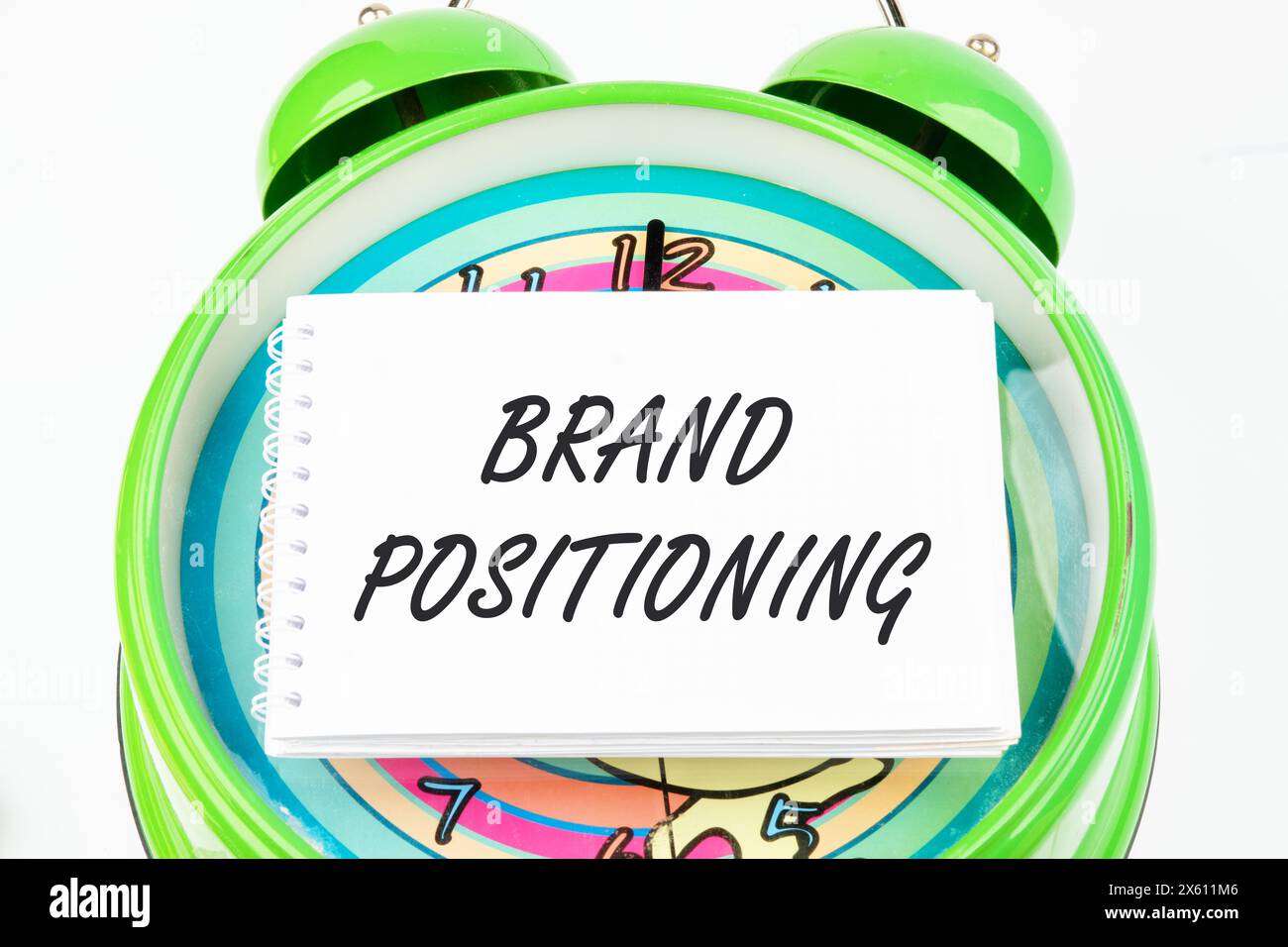 Brand positioning is shown on a business card on the watch face Stock ...