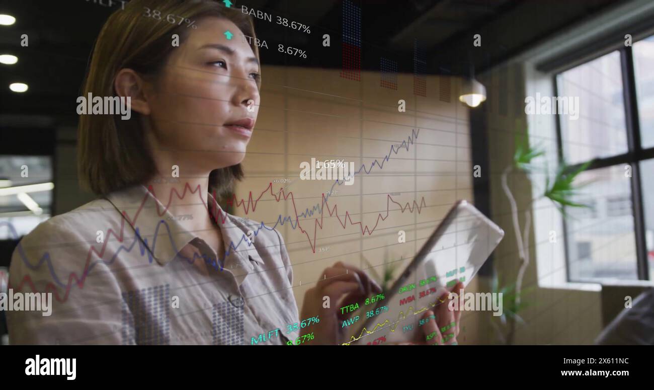 Image of multiple graphs and trading boards over asian woman scrolling ...