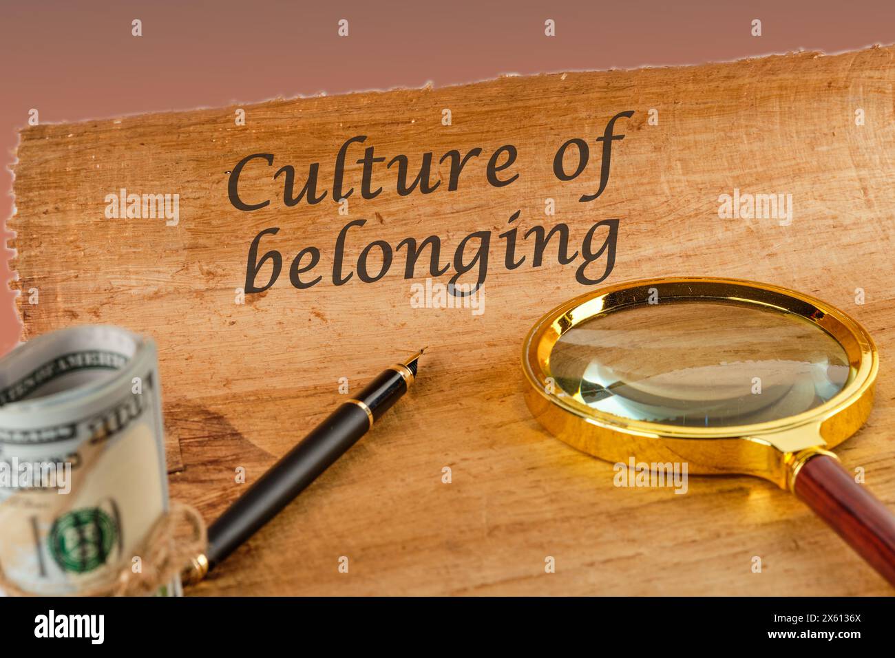 Culture of belonging symbol on papyrus next to a magnifying glass and ...