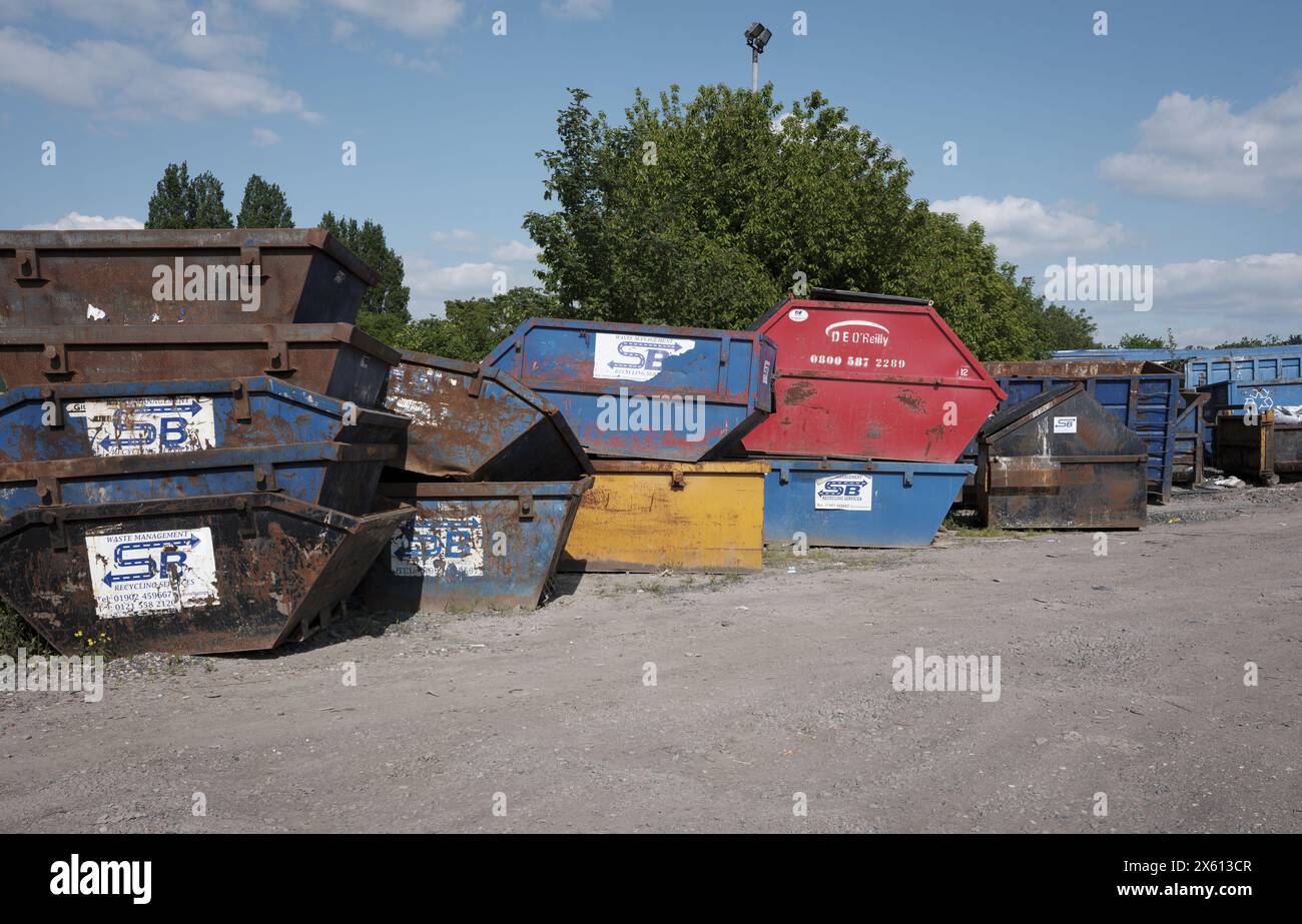 Empty skips in yard of waste management and recycling company Stock ...