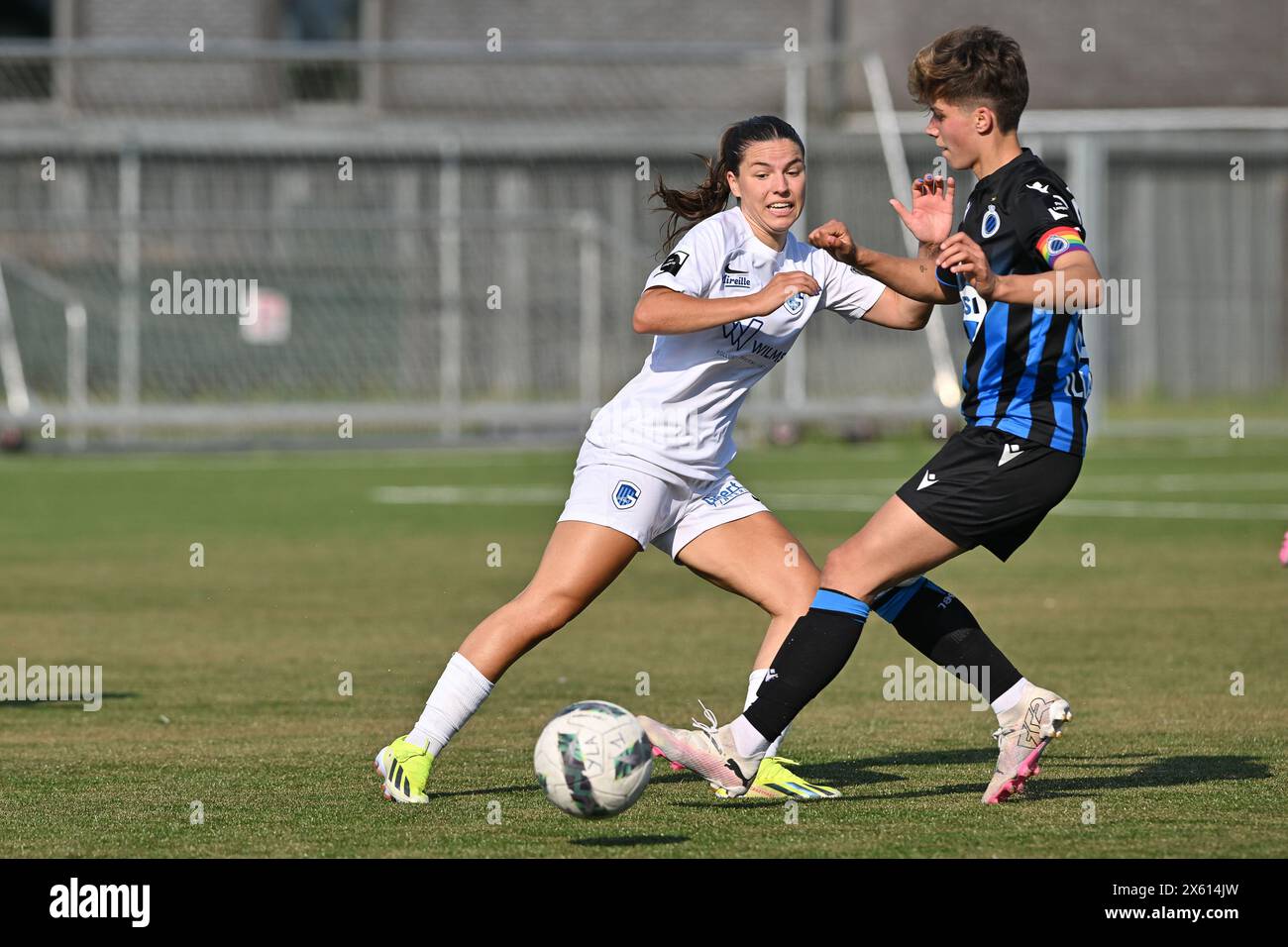 Luna Vanzeir (30) of Genk and Isabelle Iliano (18) of Club YLA pictured during a female soccer ...