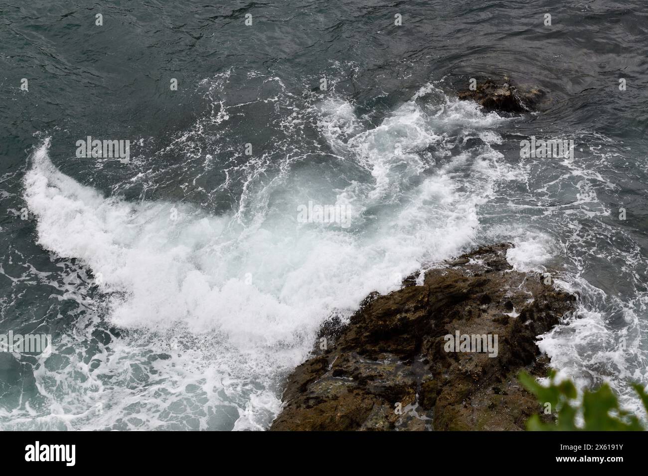 Port Issac Coastline with the Sea breaking on the Rocks Cornwall ...
