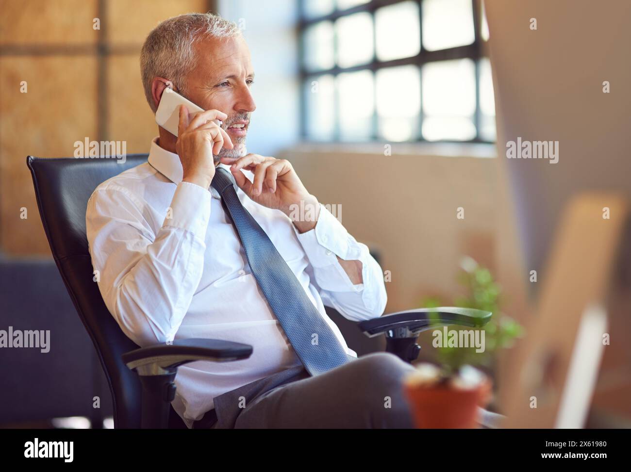 Mature businessman, CEO and phone call in office with problem solving ...