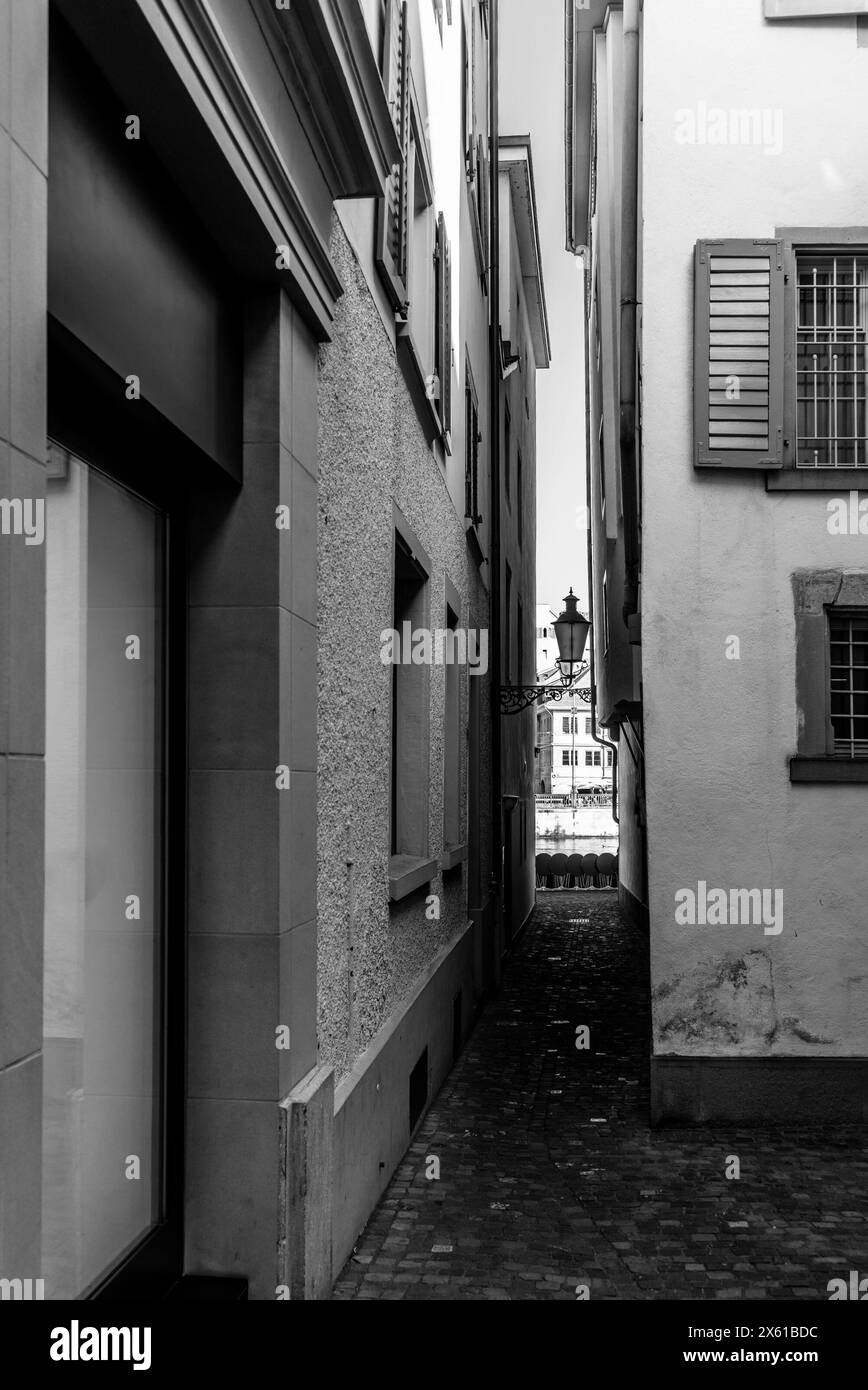 A hidden narrow alley in the center of Zurich old town ("Altstadt") in ...