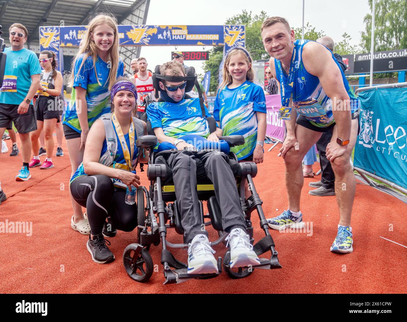 Rob Burrow alongside wife Lindsey (who ran the half marathon ...