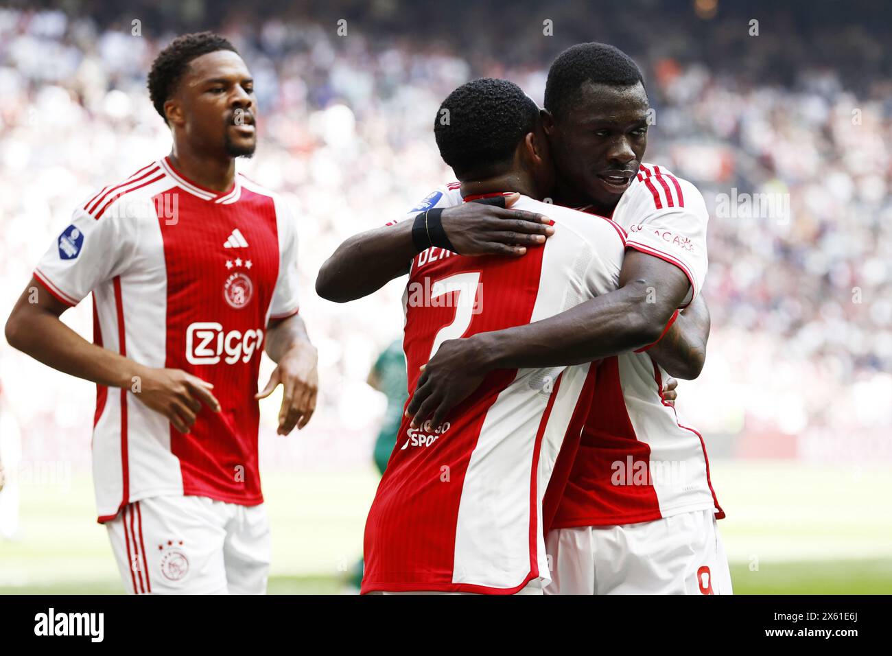 AMSTERDAM - (l-r) Chuba Akpom of Ajax, Steven Bergwijn of Ajax, Brian Brobbey of Ajax celebrate ...