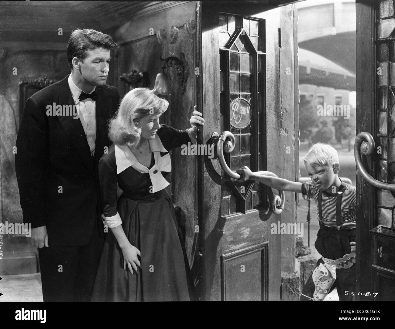 BILL FRASER, VIRGINIA McKENNA and a little boy in a scene from THE ...