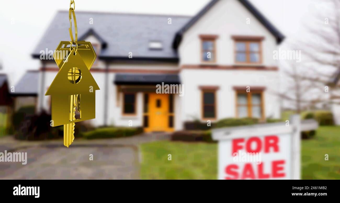 Image of gold house key fob and key, hanging in front of blurred house ...