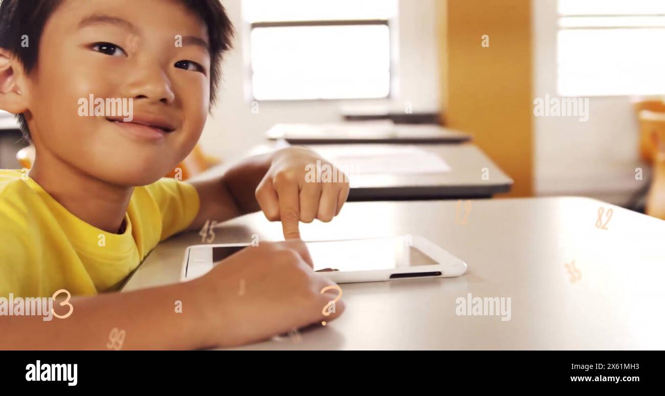 Image of multiple numbers over close of smiling asian boy using digital ... Image of multiple numbers over close of smiling asian boy using digital ...