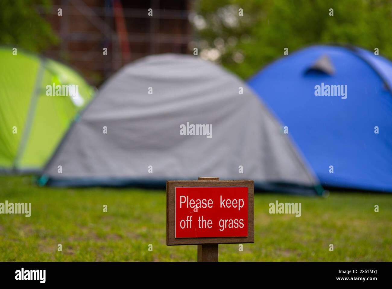 Leeds, UK. 07 MAY, 2024. Tents behind a "Please keep off the grass ...