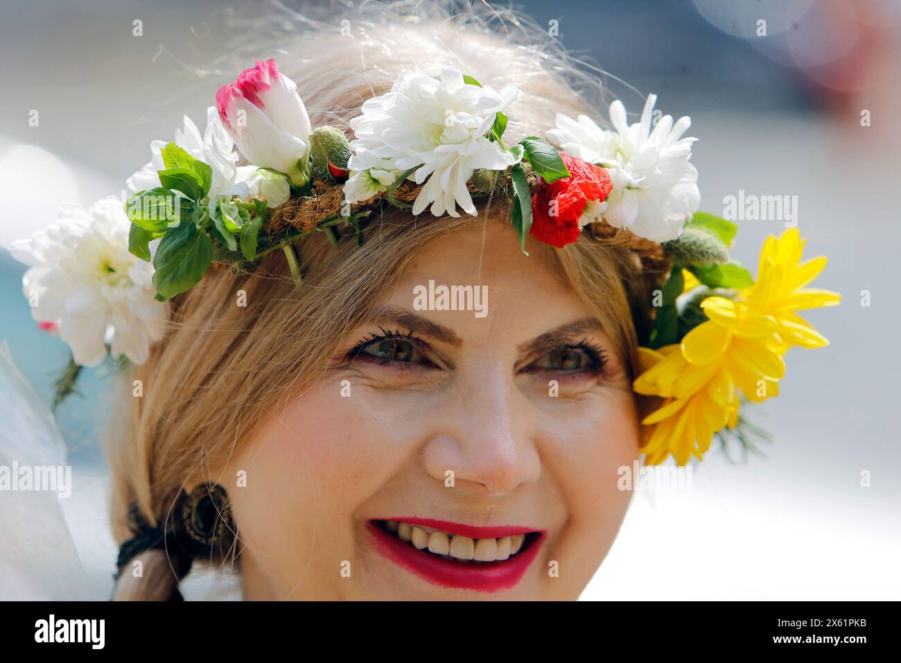 Bucharest, Romania. 12th May, 2024. A woman wearing handmade ...