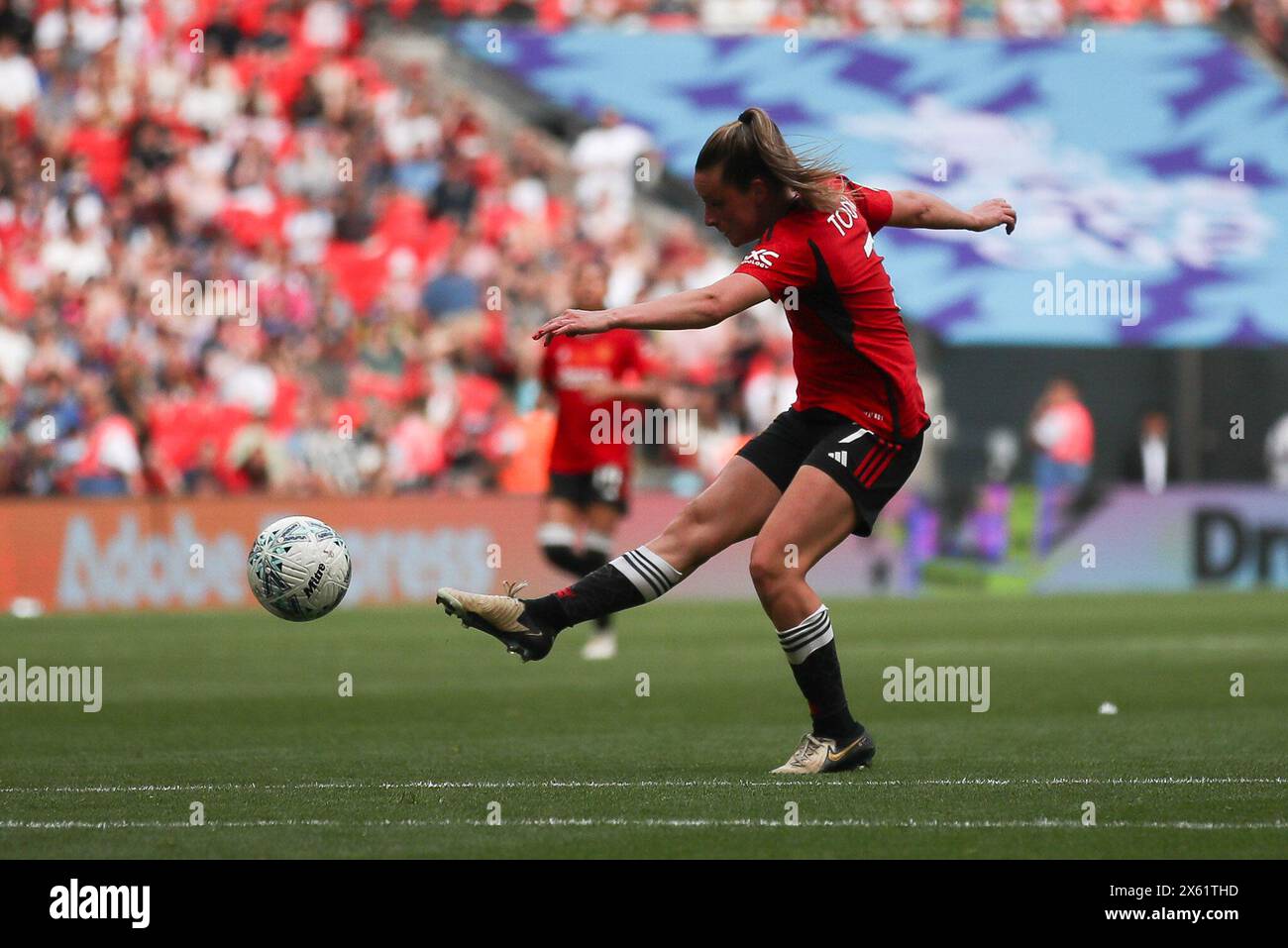 Ella Toone of Manchester United Women smashes the ball into the top ...