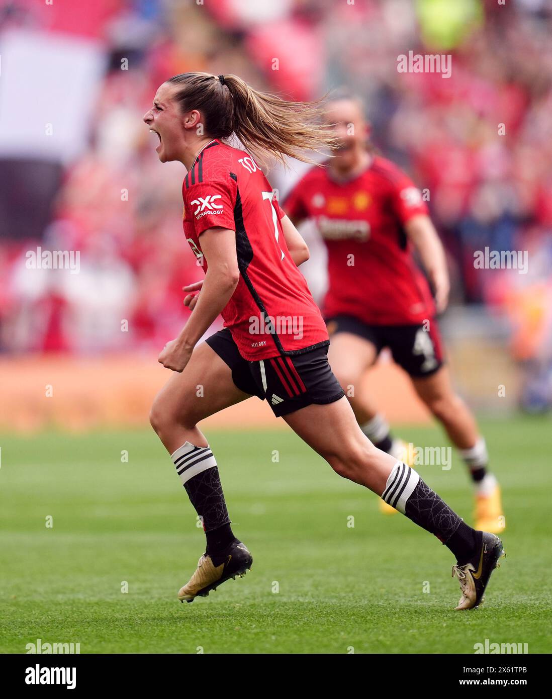 Manchester United's Ella Toone celebrates scoring their side's first ...