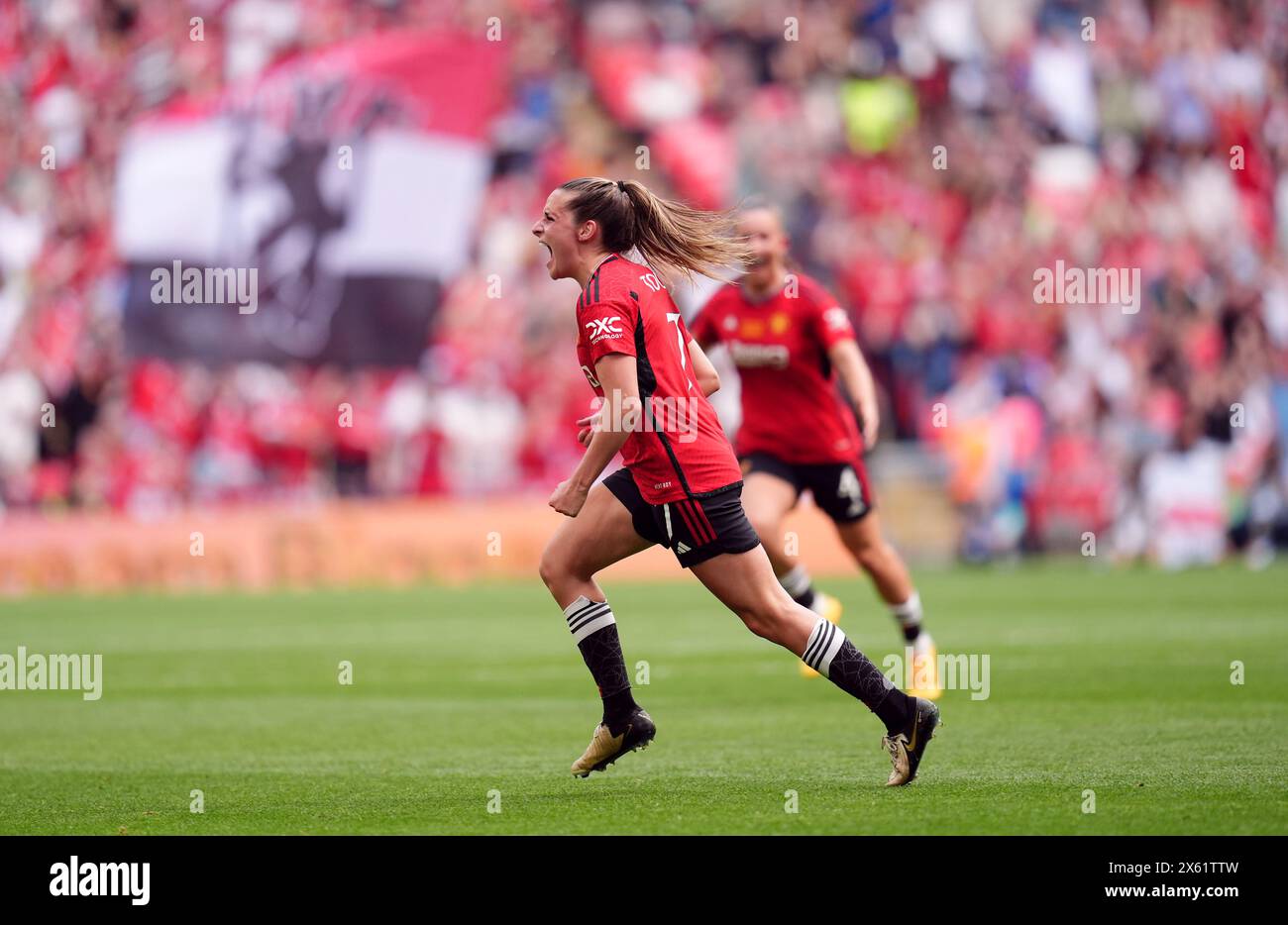 Manchester United's Ella Toone celebrates scoring their side's first ...