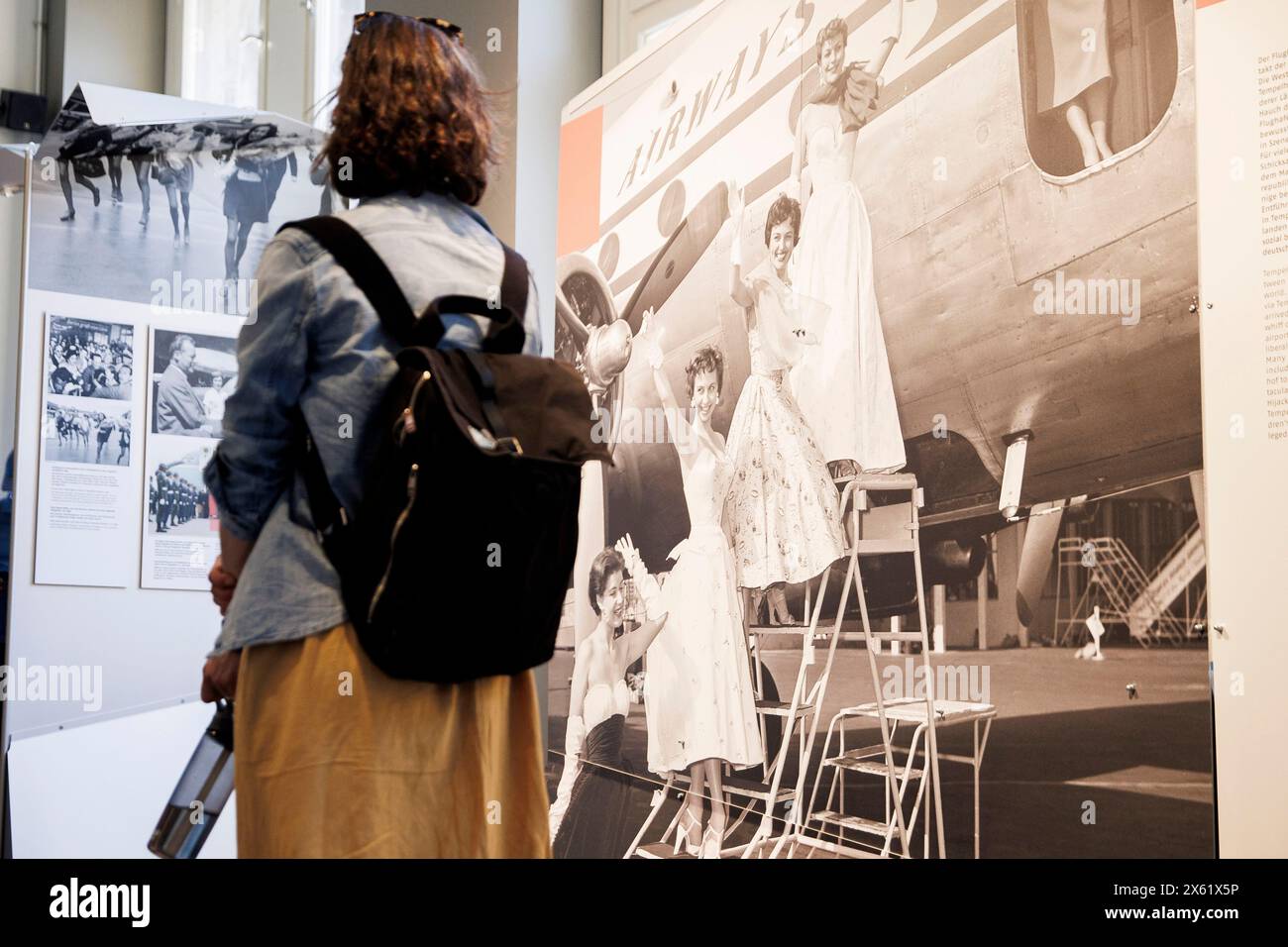 Berlin, Germany. 12th May, 2024. A visitor stands in an exhibition to ...