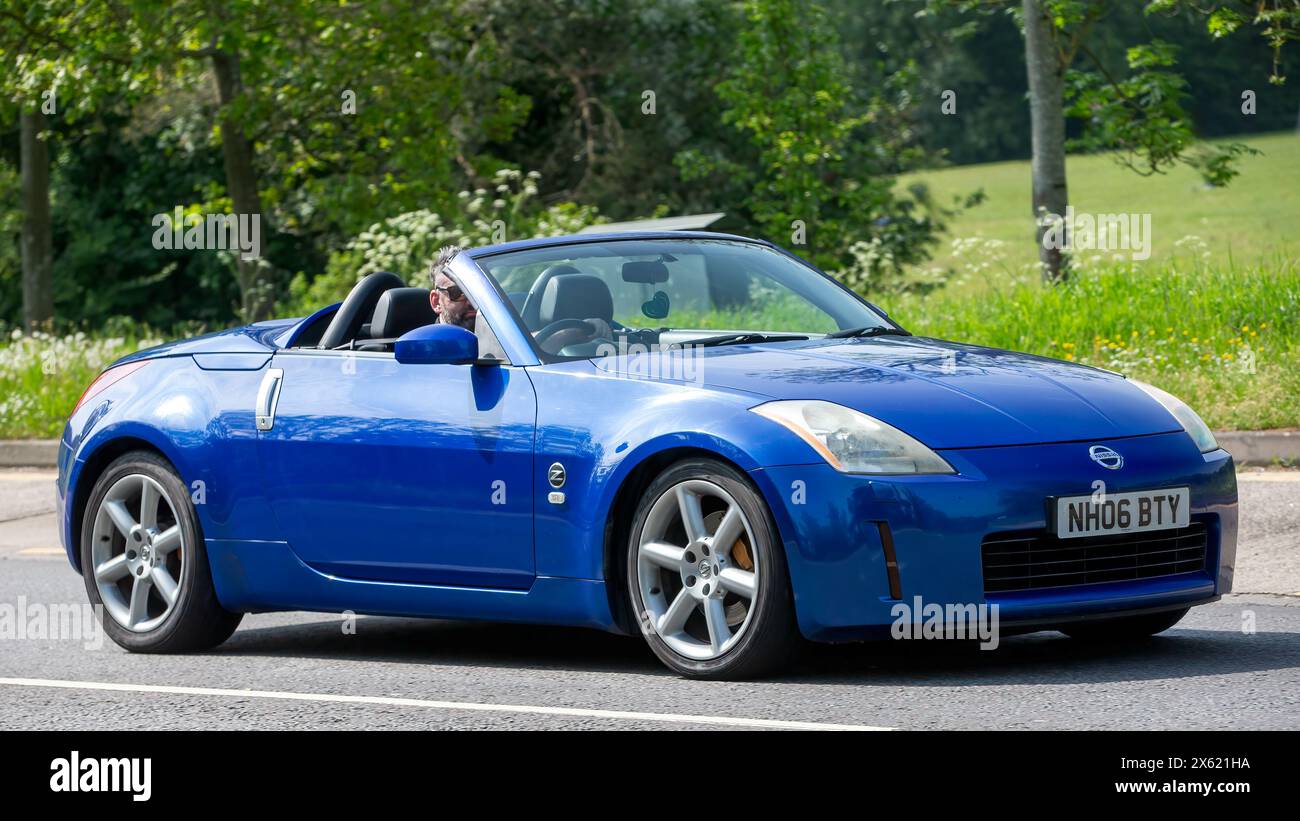 Milton Keynes,UK - May 11th 2024: 2006 blue Nissan 350Z open top car ...