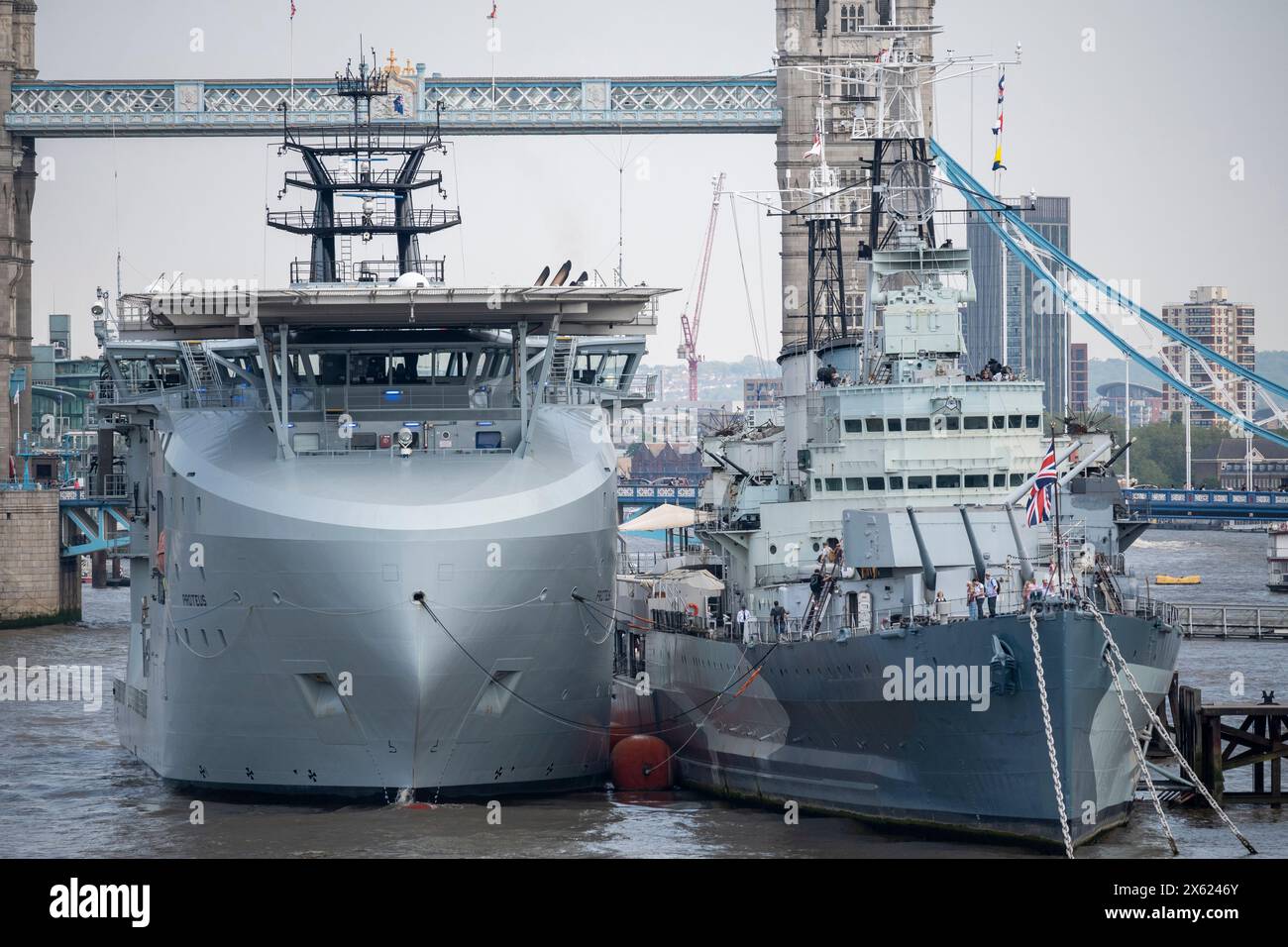 London, UK. 12 May 2024. RFA Proteus is seen moored next to HMS Belfast ...