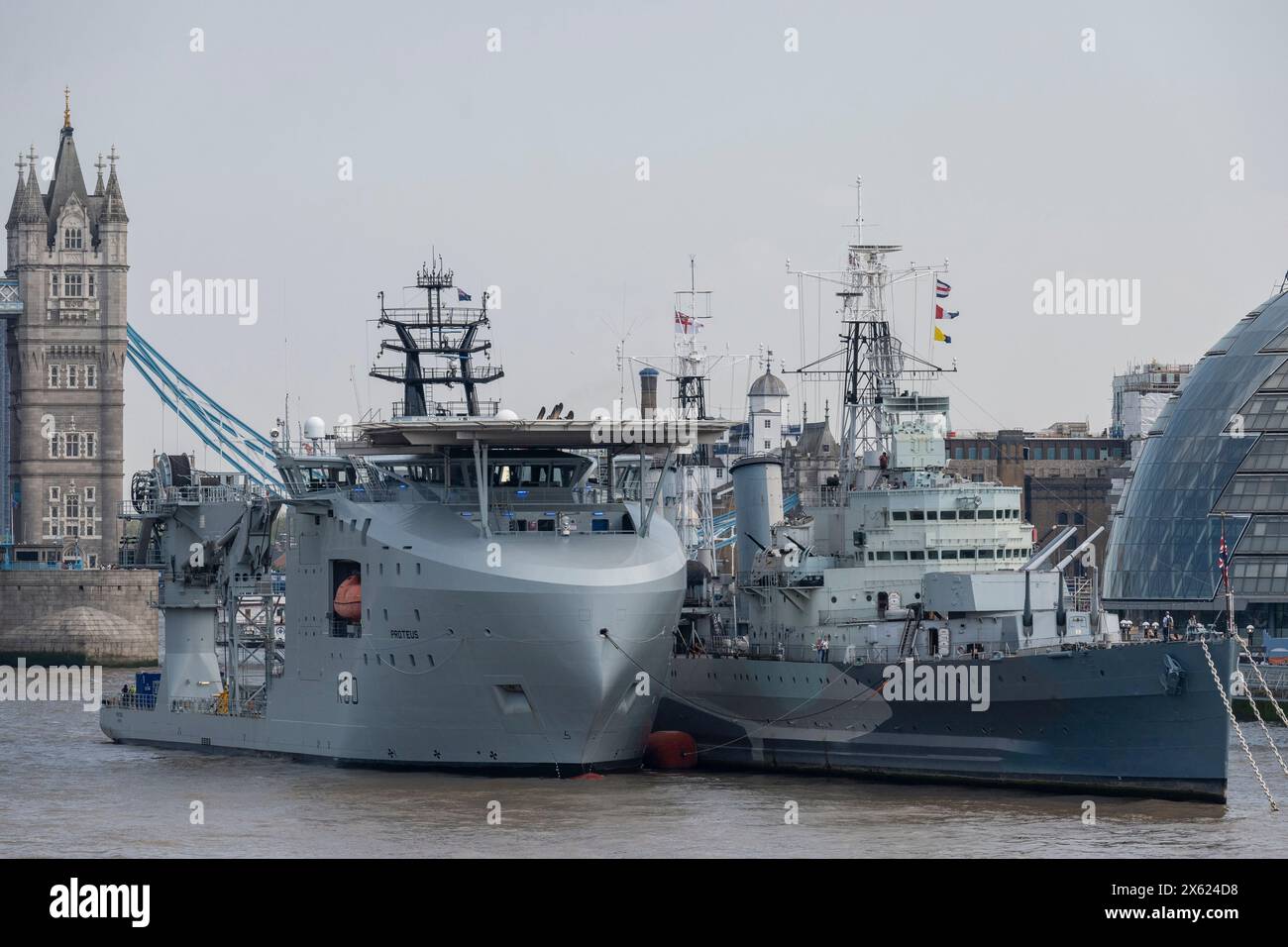 London, UK. 12 May 2024. RFA Proteus is seen moored next to HMS Belfast ...