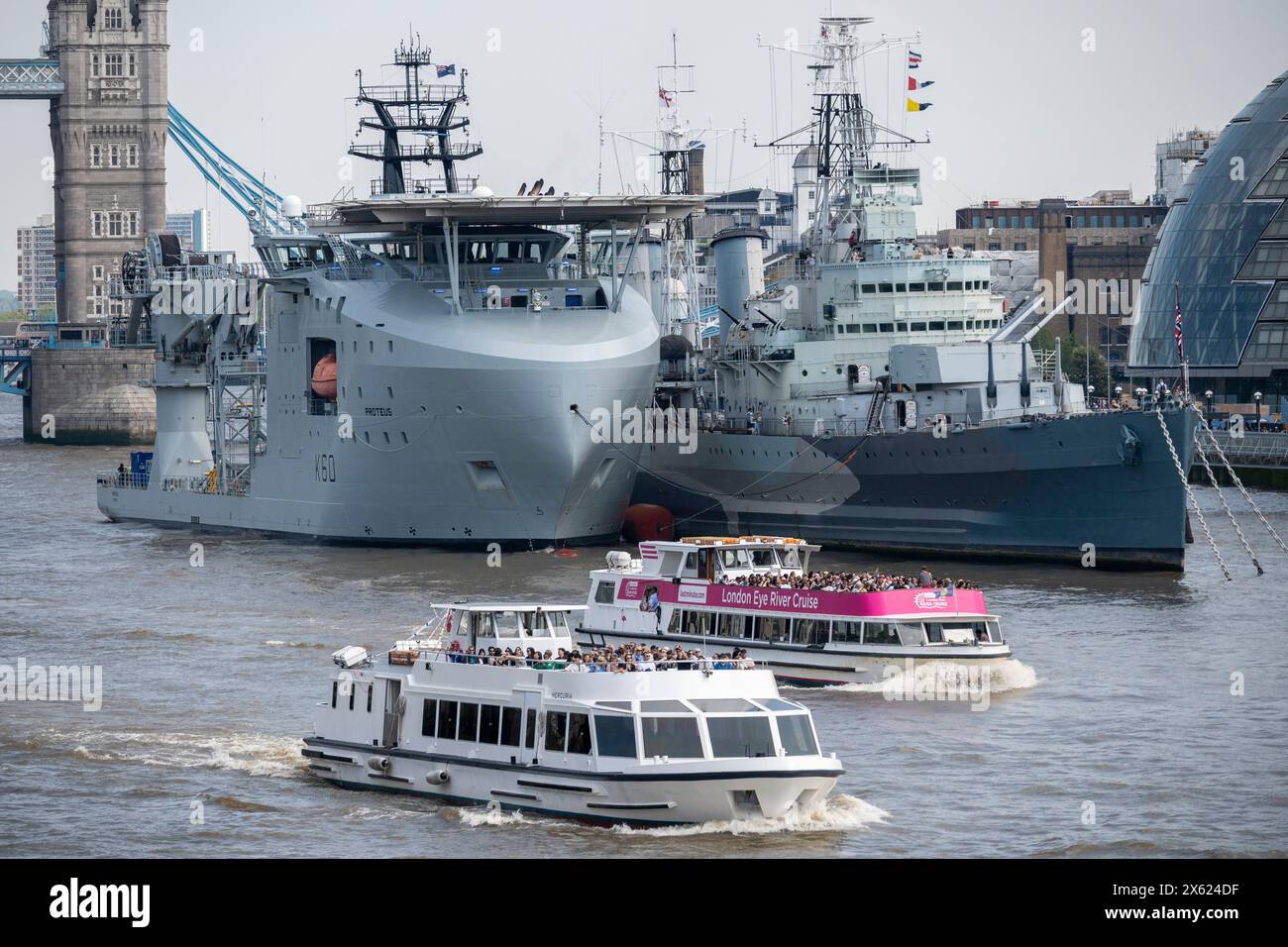 London, UK. 12 May 2024. RFA Proteus is seen moored next to HMS Belfast ...