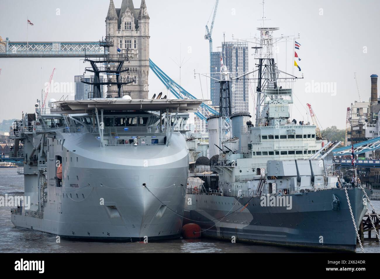 London, UK. 12 May 2024. RFA Proteus is seen moored next to HMS Belfast ...