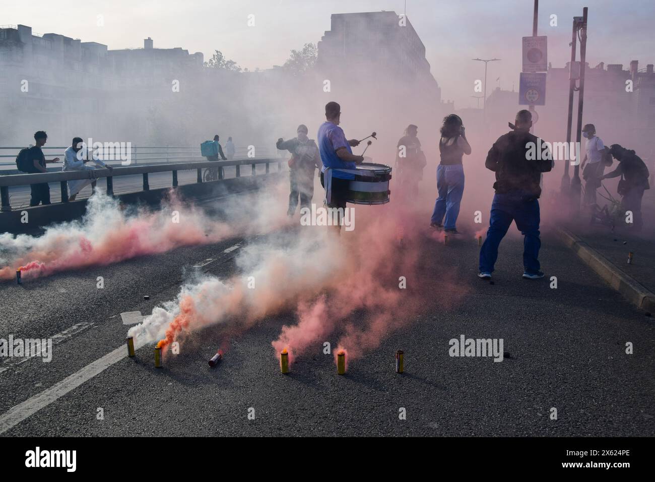 London, UK. 11th May 2024. Pro-Palestine protesters set off smoke ...