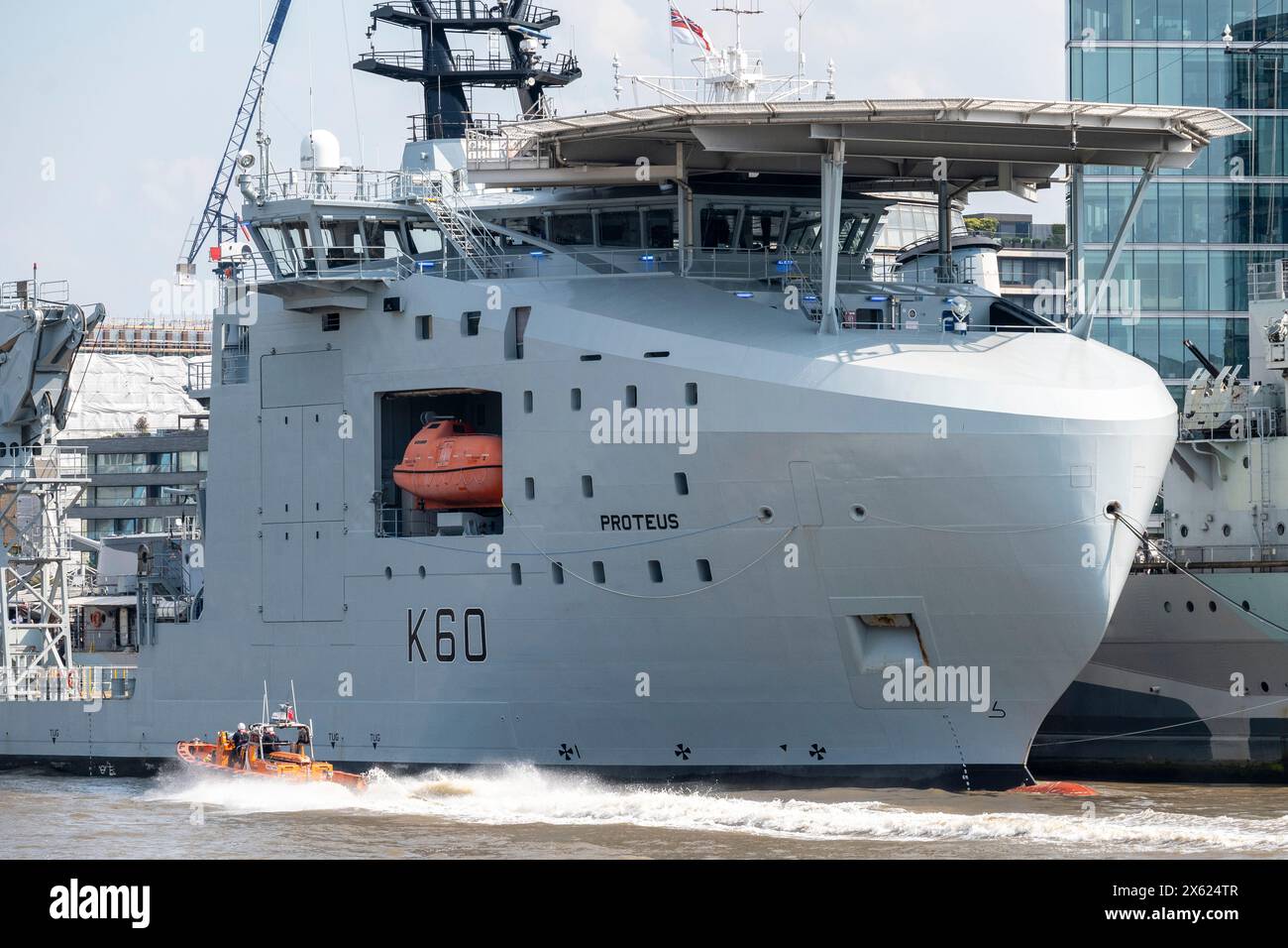 London, UK. 12 May 2024. RFA Proteus is seen moored next to HMS Belfast ...